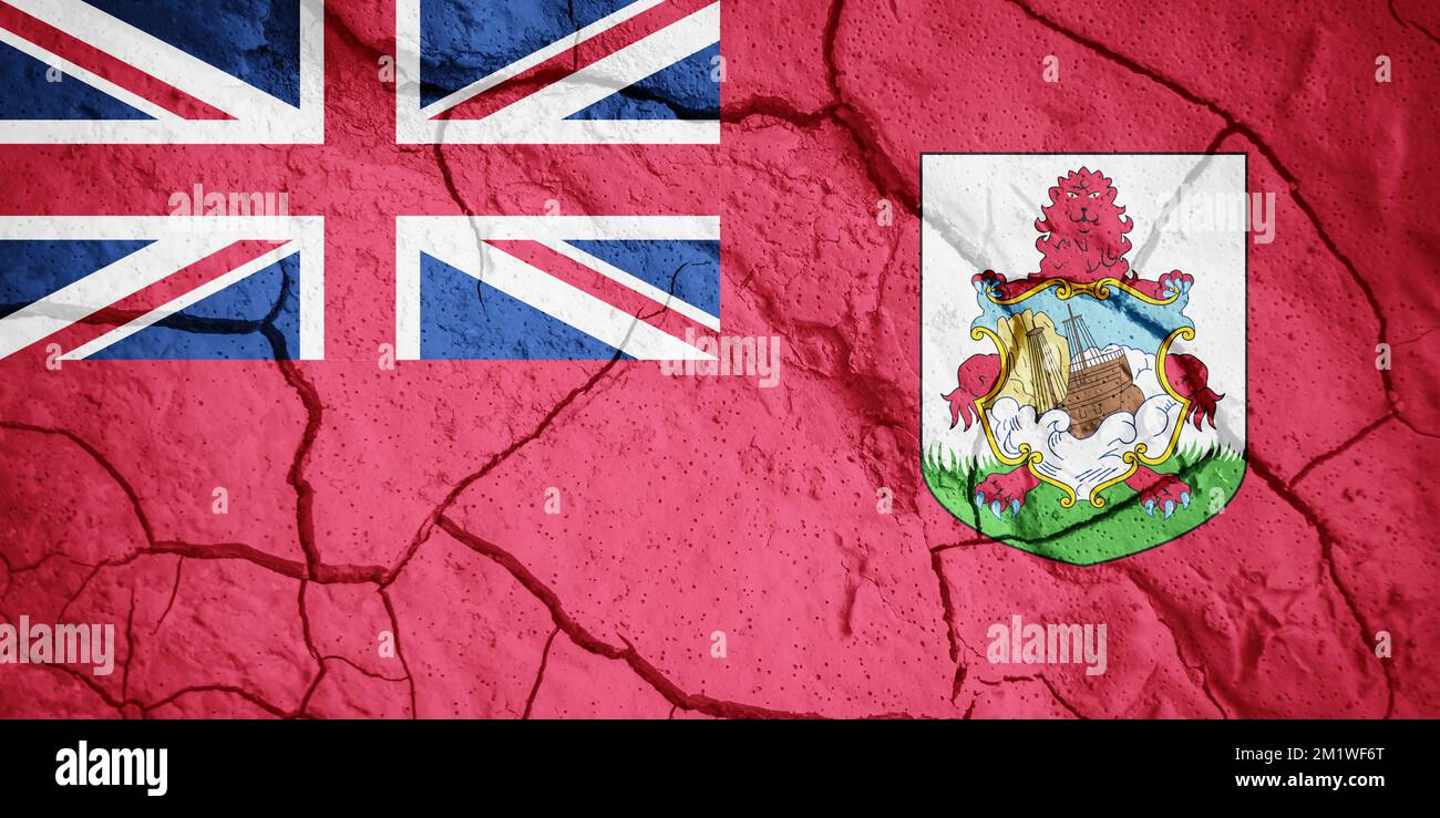 Flag of Bermudas. Bermuda symbol. Flag on the background of dry cracked ...