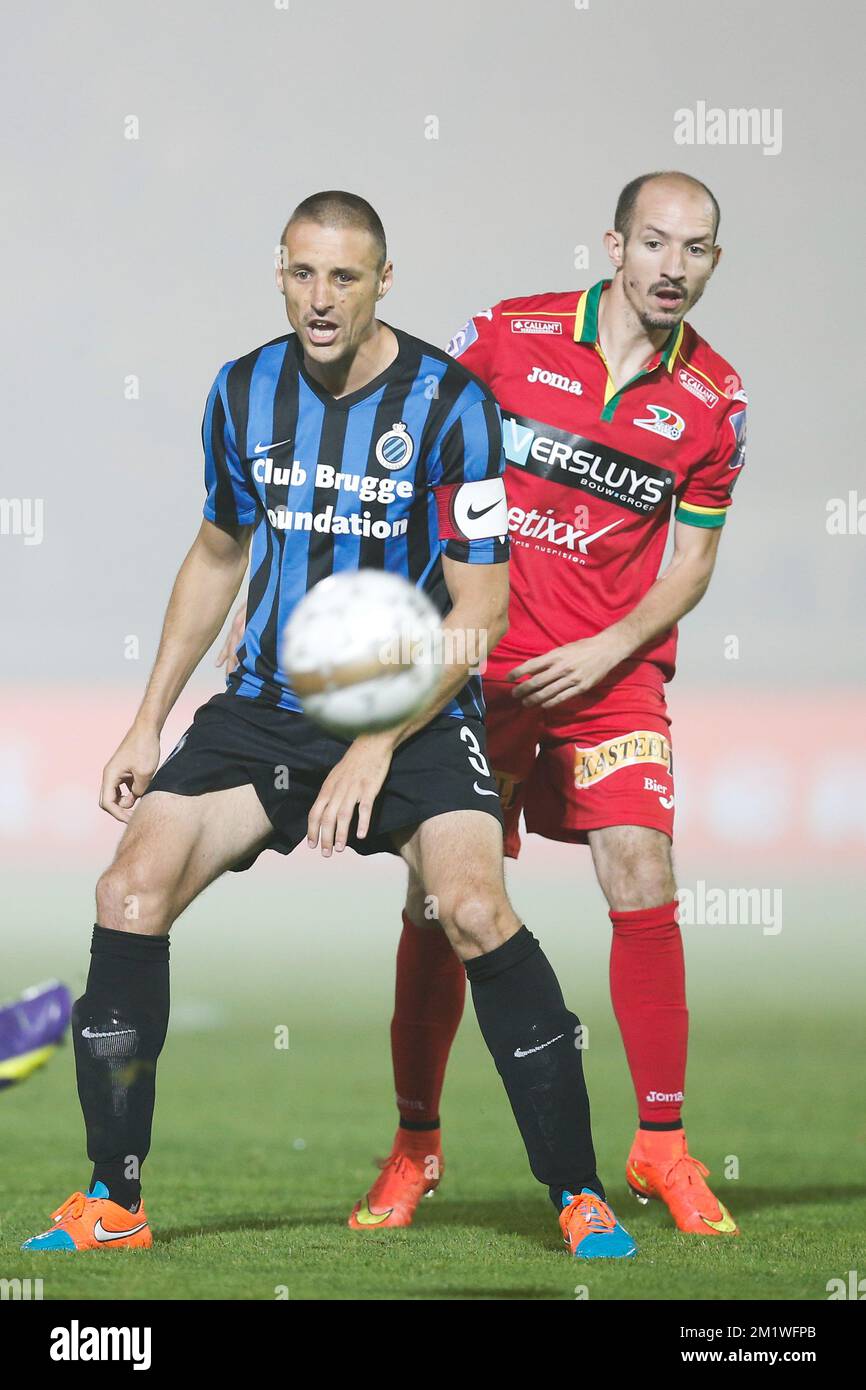 20140928 - OOSTENDE, BELGIUM: Club's Timmy Simons and Oostende's Frank ...