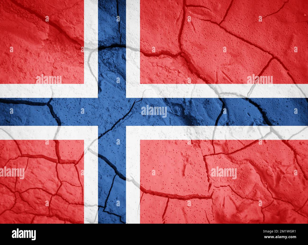 Flag of Norway. Norwegian symbol. Flag on the background of dry cracked ...