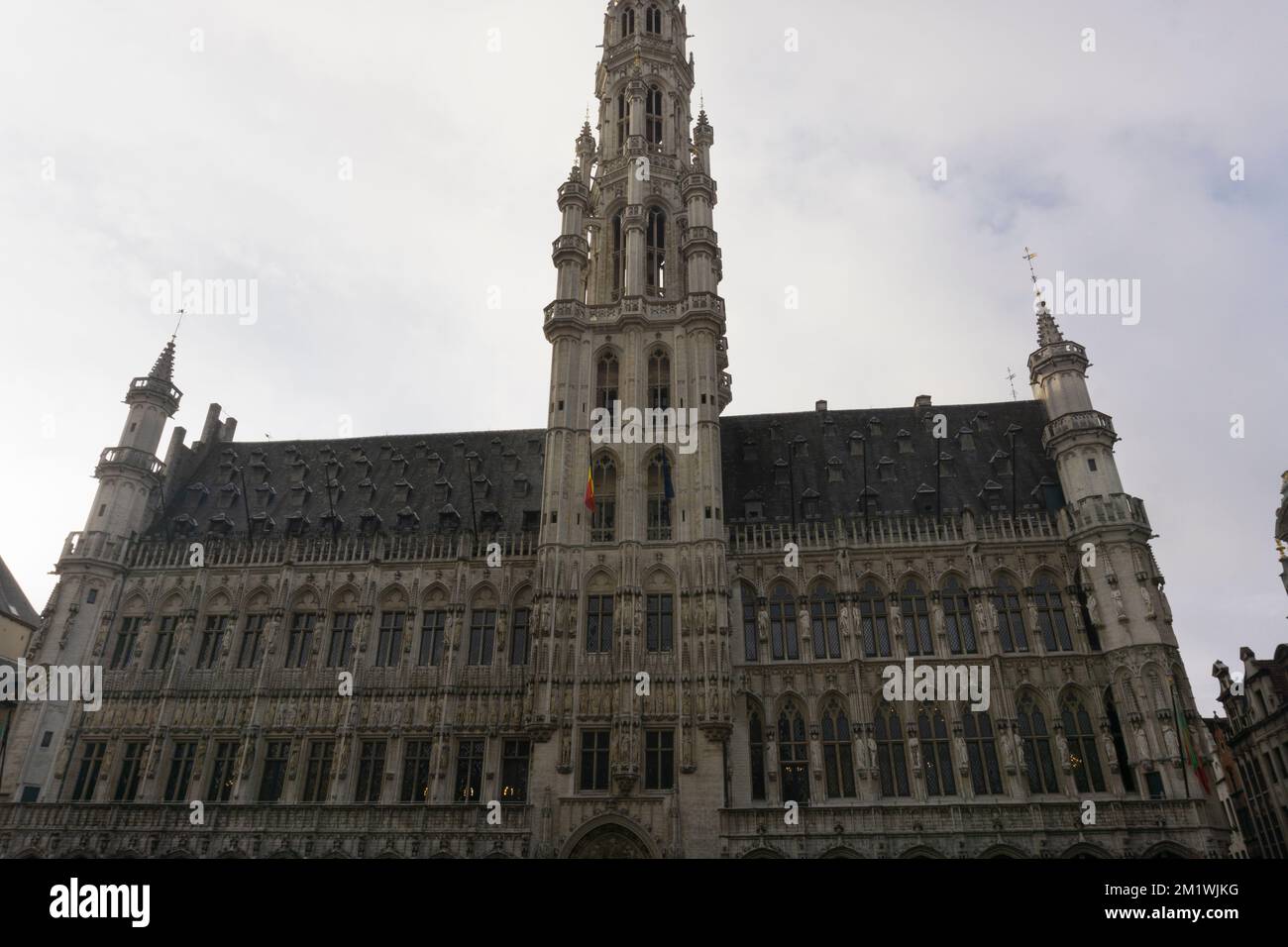 Beautiful brussels town hall building in sunny day with cloudy blue sky ...