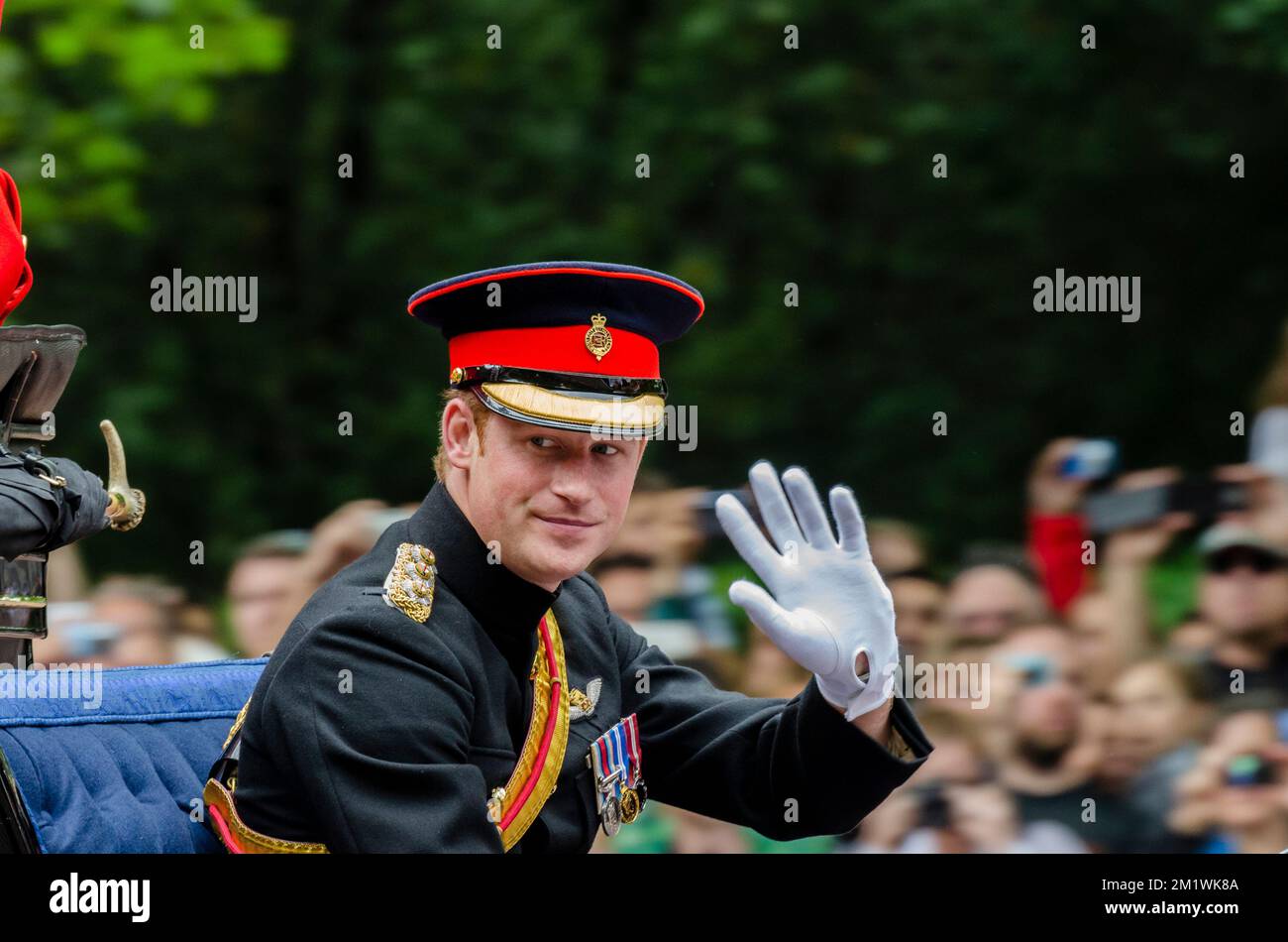 Prince Harry in British Army military dress uniform in a carriage at ...