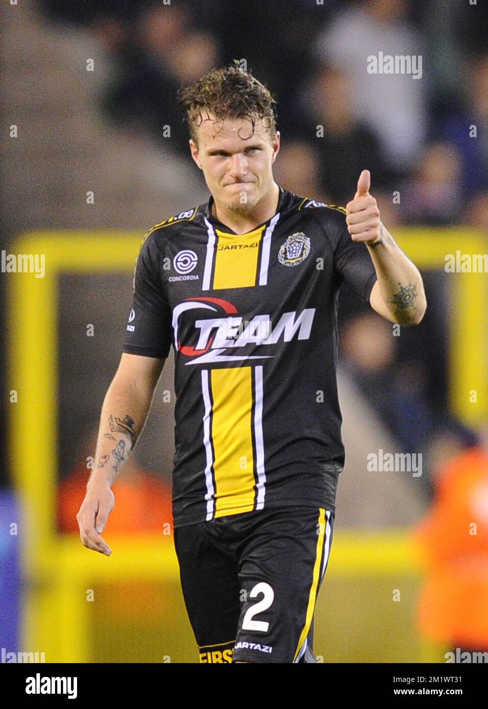 20141026 - MOUSCRON, BELGIUM: Lokeren's Alexander Scholz leaves the ...