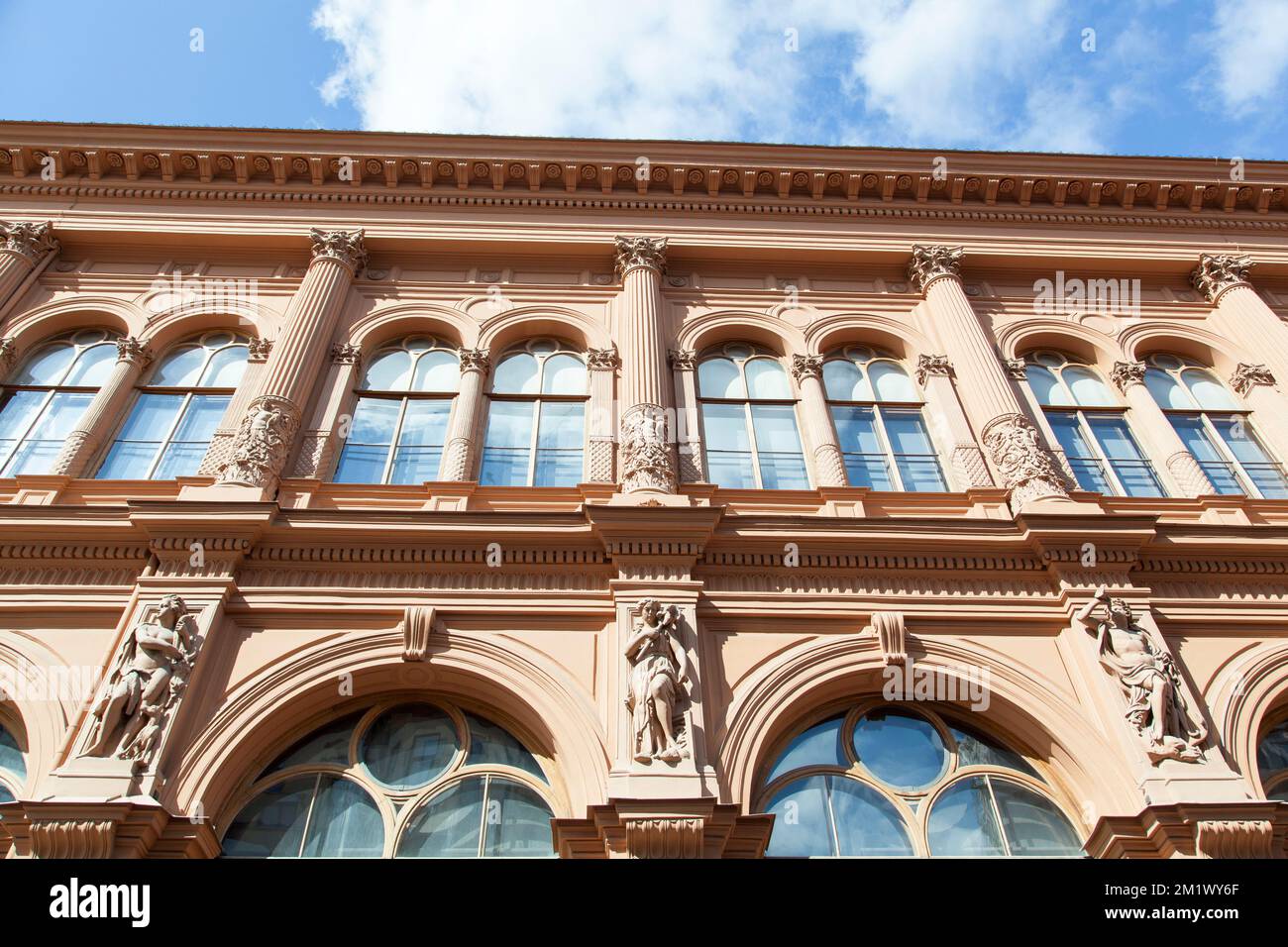 The exterior with sculptures of a historic building in Riga old town ...