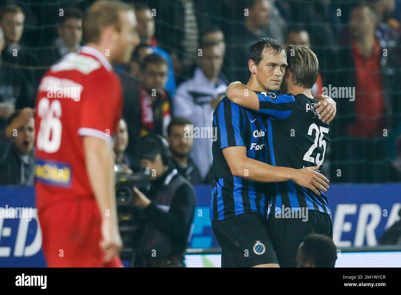 20141030 - MOUSCRON, BELGIUM: Club's Tom De Sutter (2R) celebrates ...