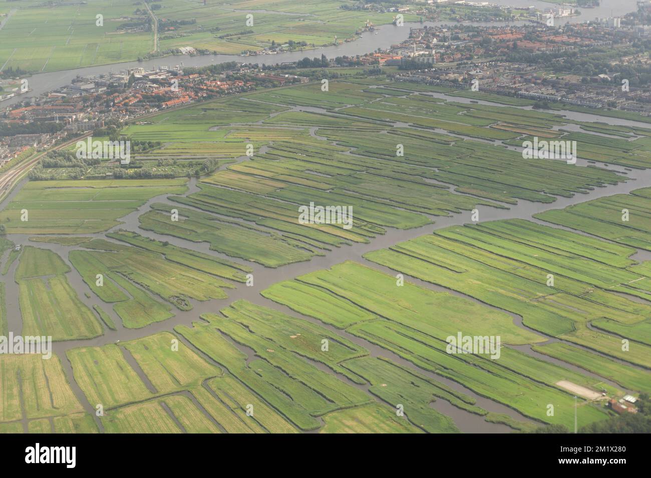 Famous polder fields at amsterdam city viewed from an airplane on sunny ...