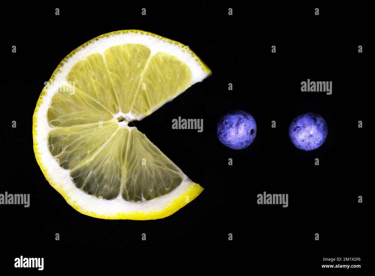 lemon wedge that simulates the famous video game Stock Photo - Alamy