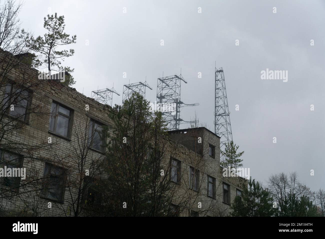 Radar OTH missile defense system structure with abandoned building and ...