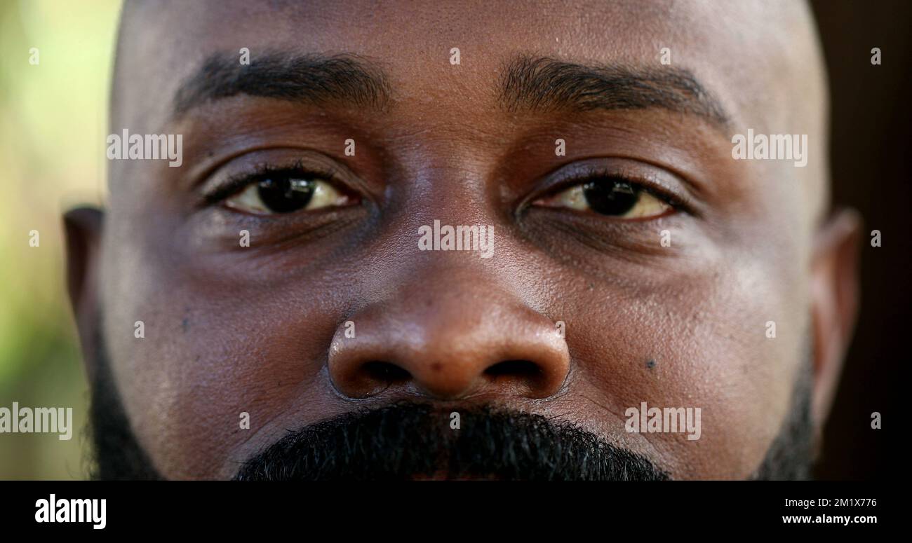 African black man close-up eyes looking at camera, real people Stock ...