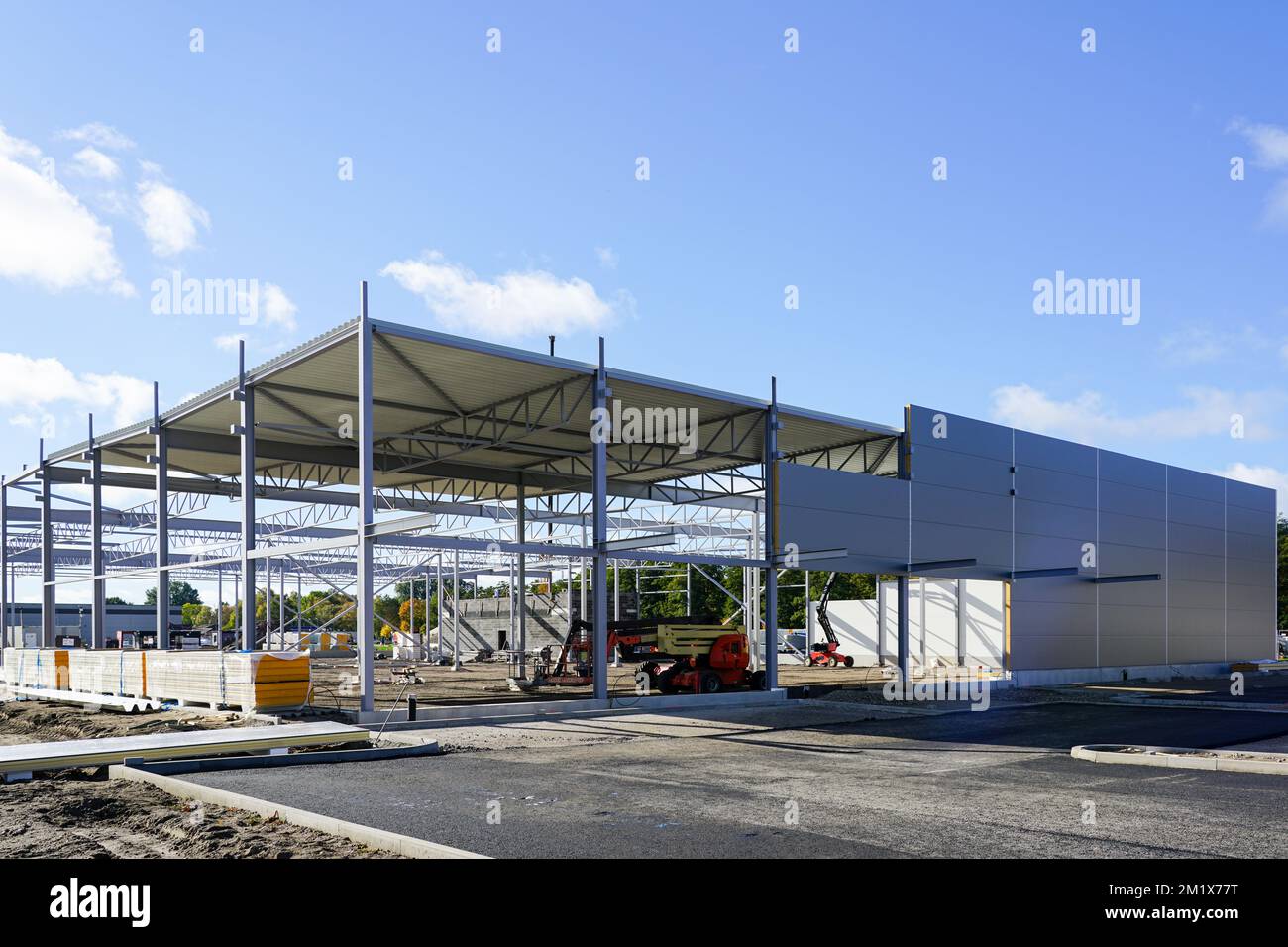 Assembled steel framework with partial assembled sandwich panel wall ...