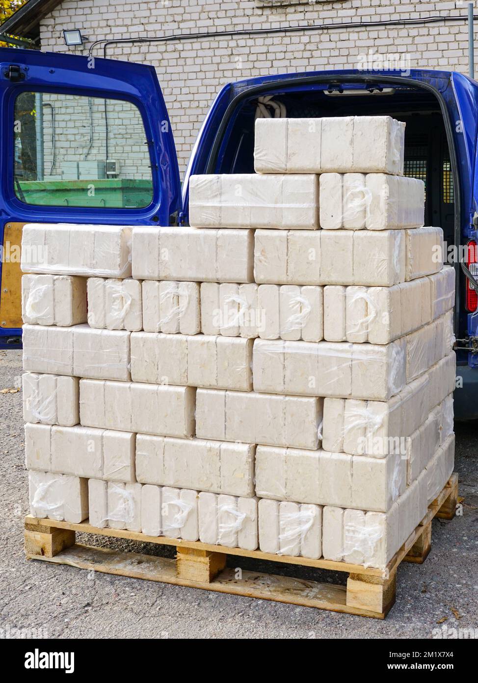 Pallet with alternative fuel, bio fuel. Purchased packed eco briquettes ...
