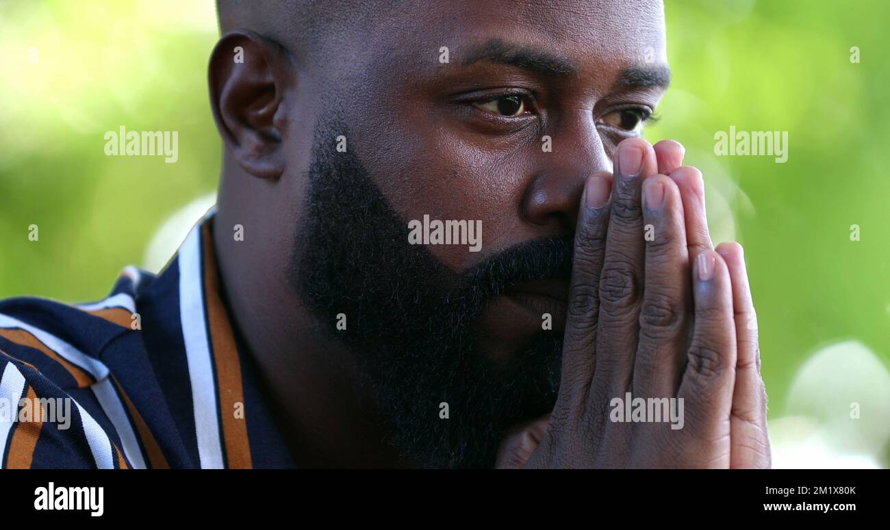 African man praying to God Stock Photo - Alamy