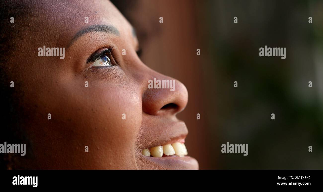 African woman looking at sky with HOPE and FAITH, Person feeling ...