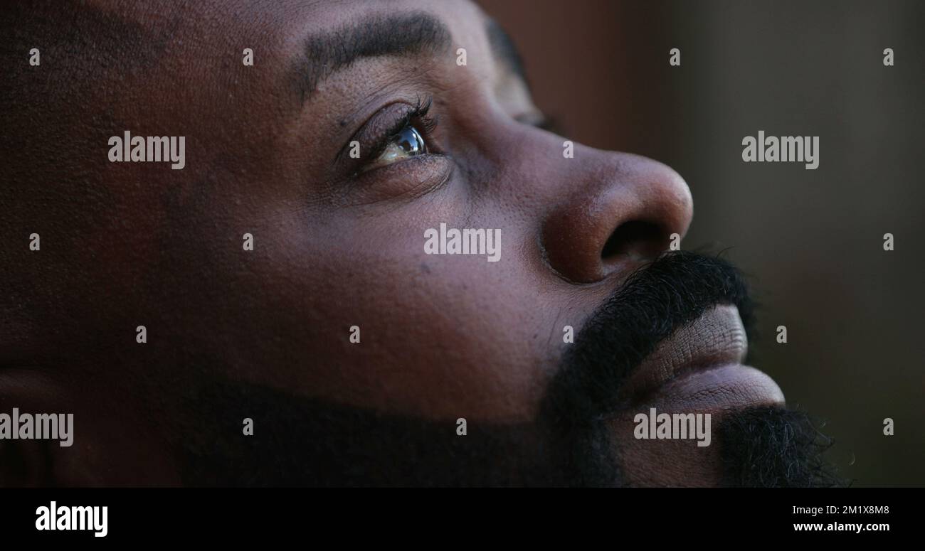 Faith african man looking sky hi-res stock photography and images - Alamy