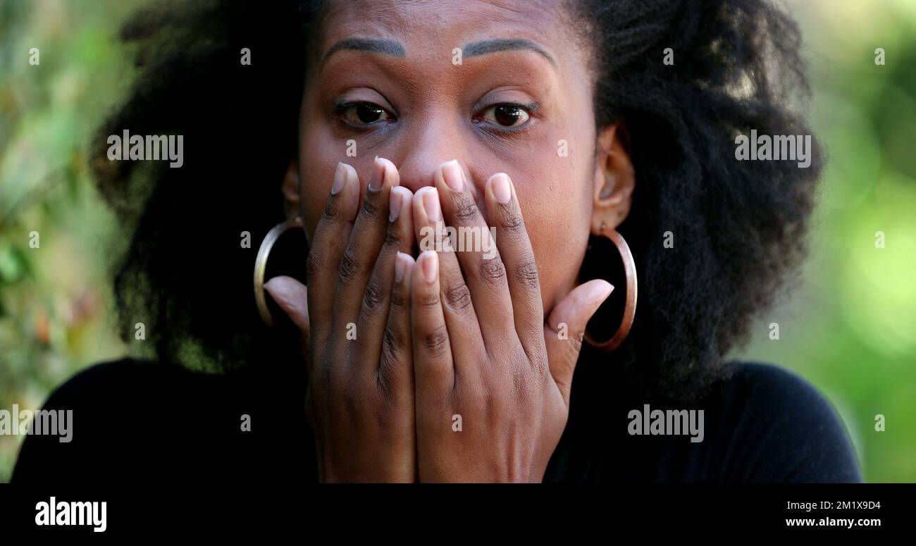 African woman reacting with SHOCK and SURPRISE Stock Photo - Alamy