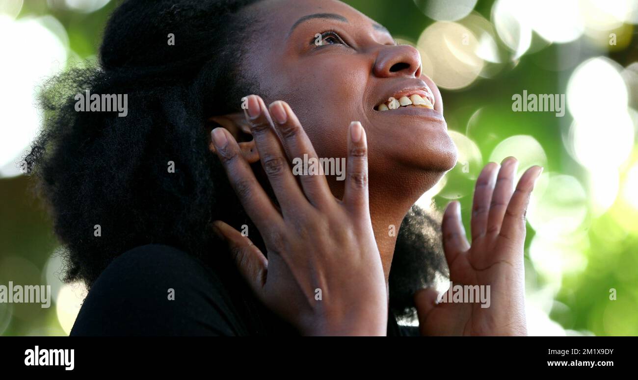 Grateful woman having hope praying hi-res stock photography and images ...