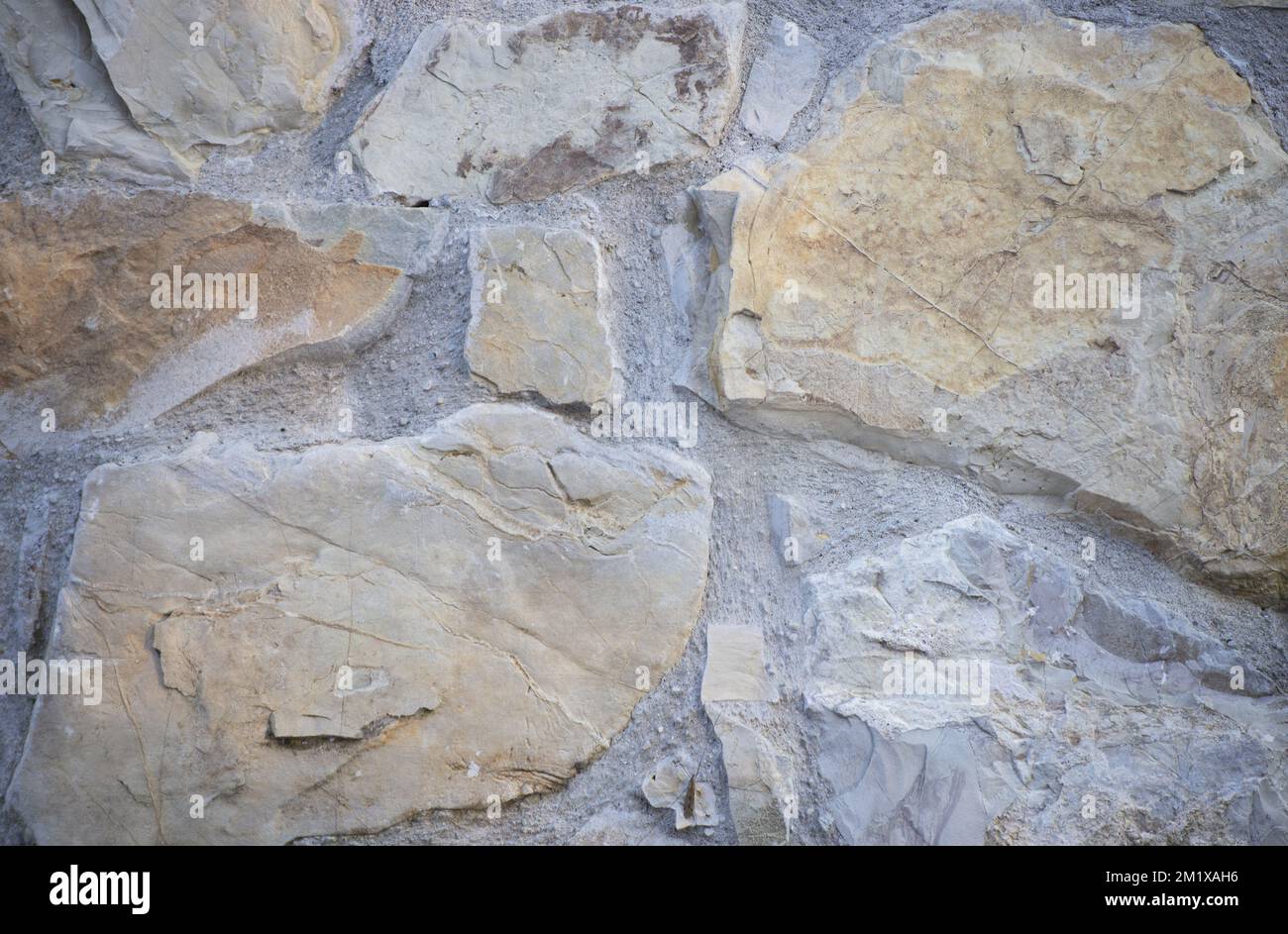 wall built with building stones Stock Photo - Alamy