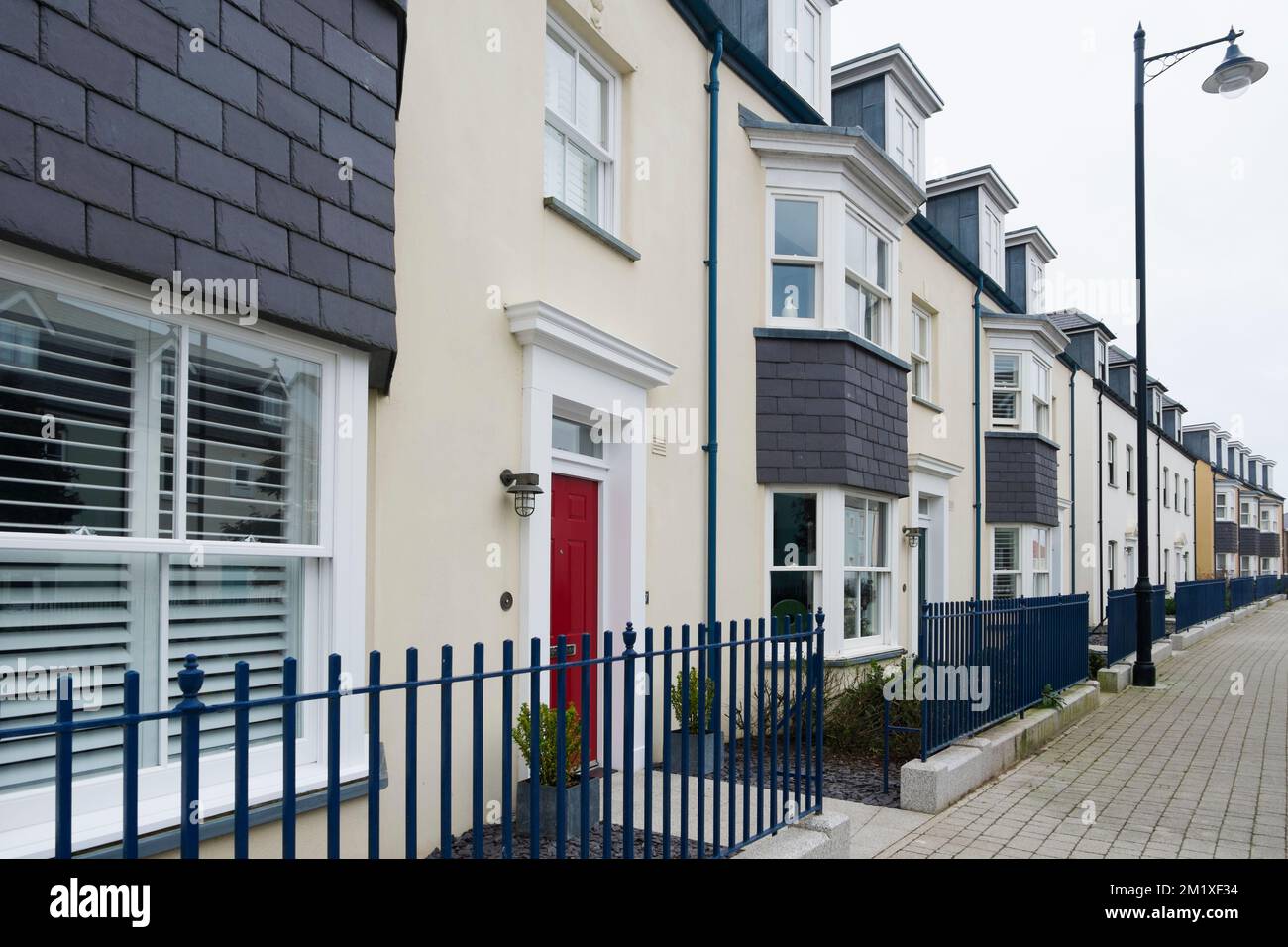A row of three storey, terraced houses on Stret Euther Penndragon ...
