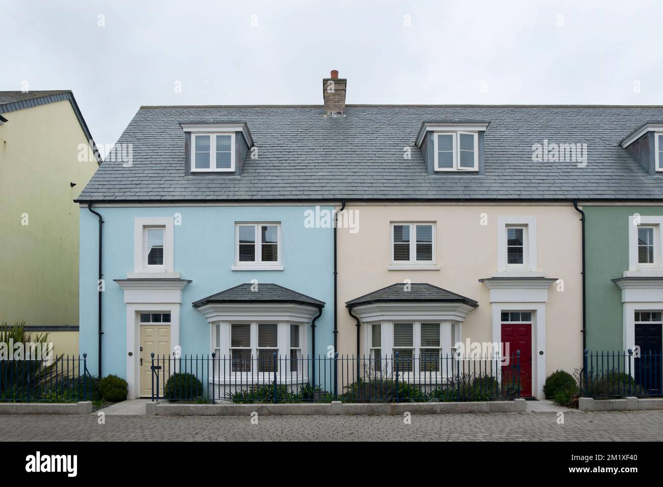 A row of three storey, terraced houses on Stret Euther Penndragon ...
