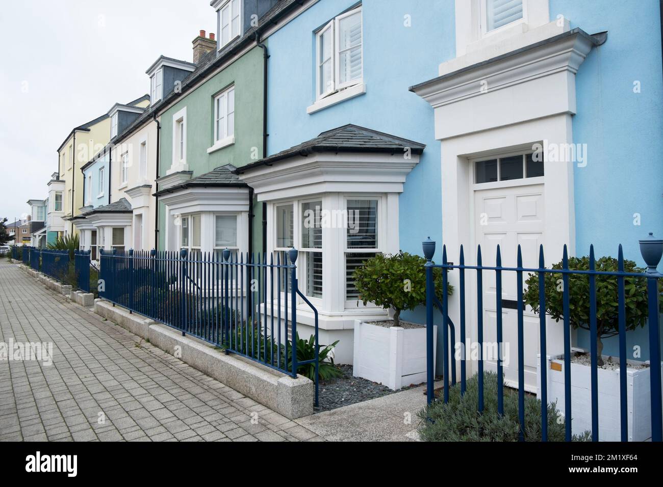 A row of three storey, terraced houses on Stret Euther Penndragon ...