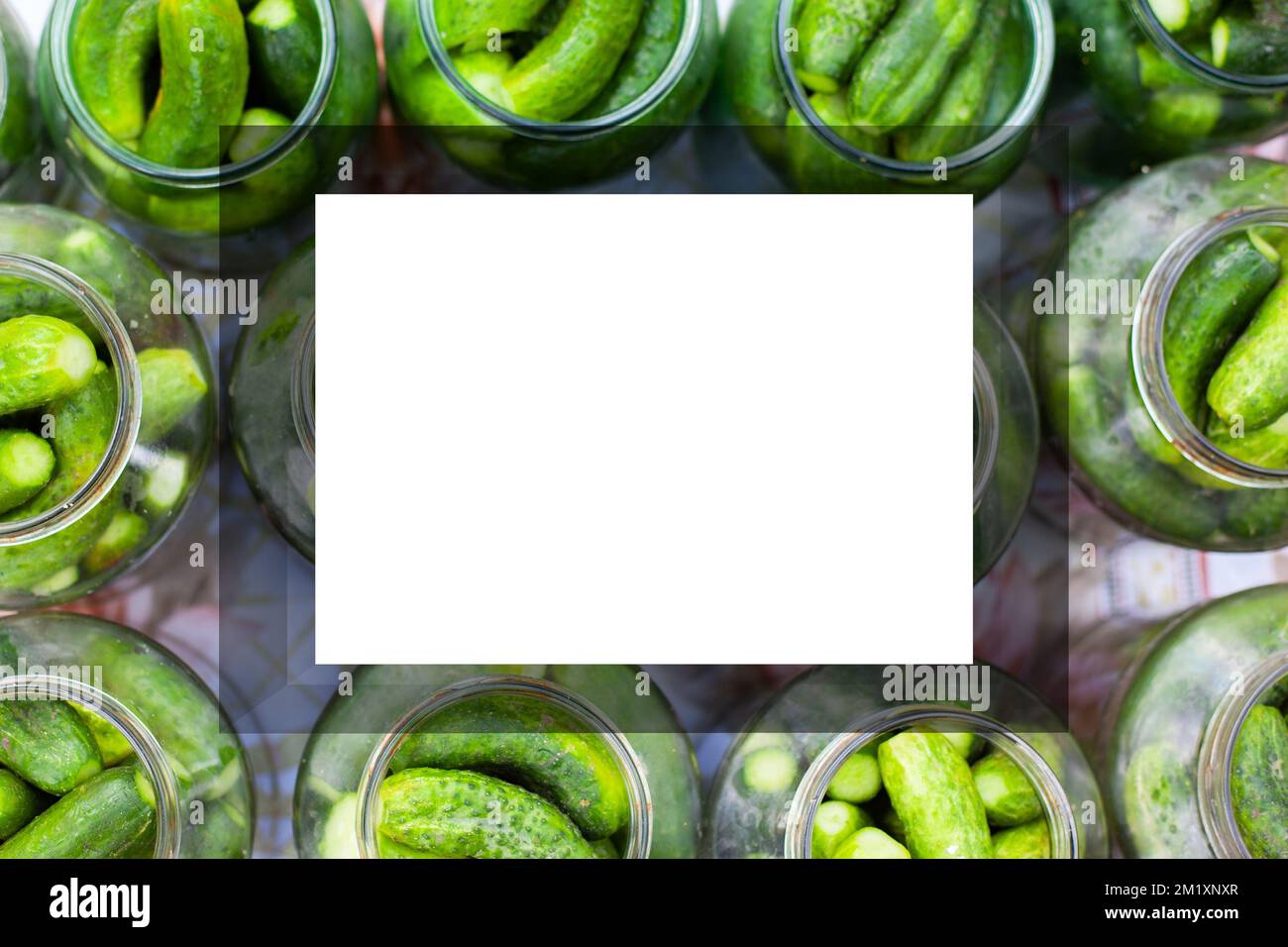 pickled cucumbers with empty mockup frame, canning vegetables 3d render ...