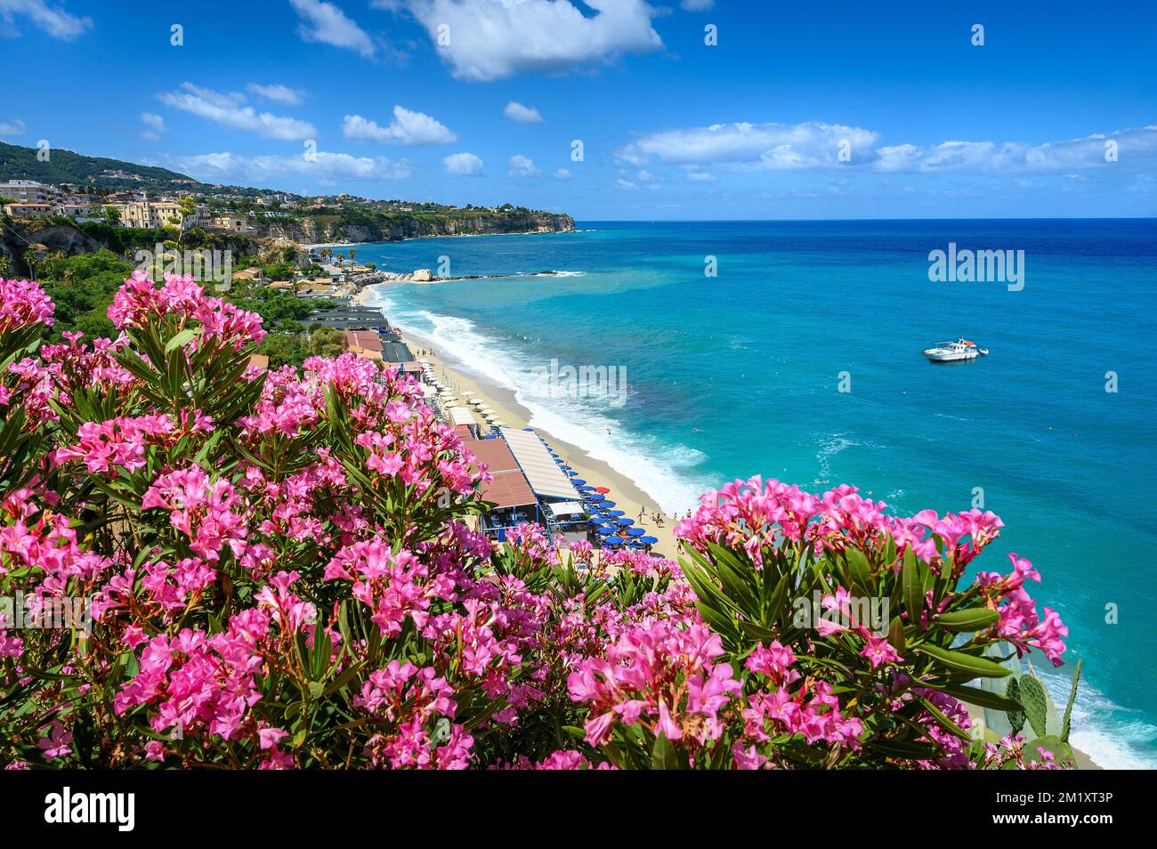 Beach and the sea by Tropea – view from behind the lilac flowers ...