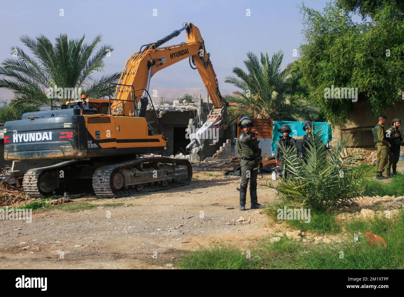 Israeli soldiers on guard against the Palestinians during the ...