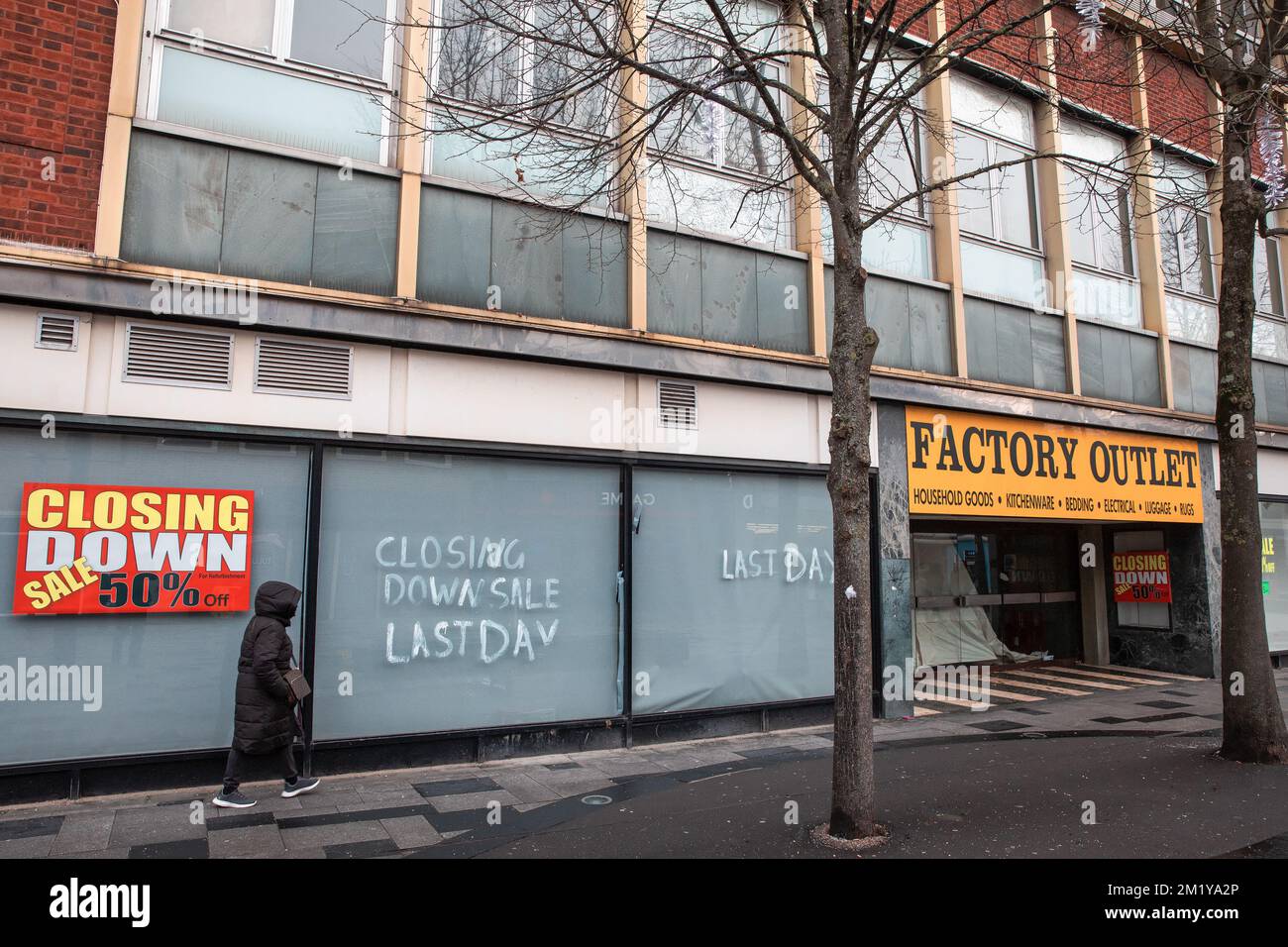 Slough, UK. 13th December, 2022. A member of the public passes a vacant ...