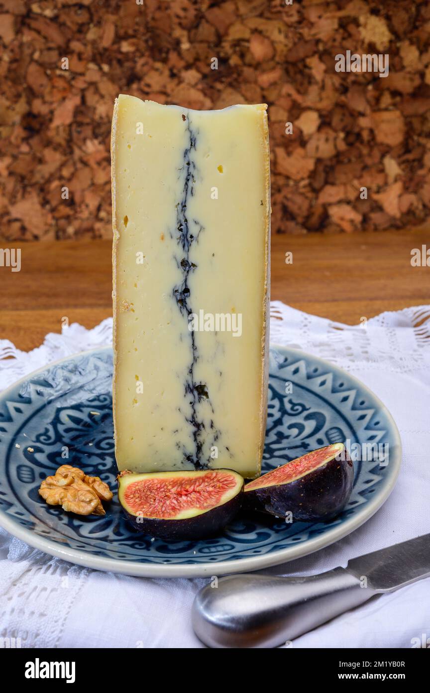 French semi-soft cow milk cheese morbier from Franche-Comte region with ...