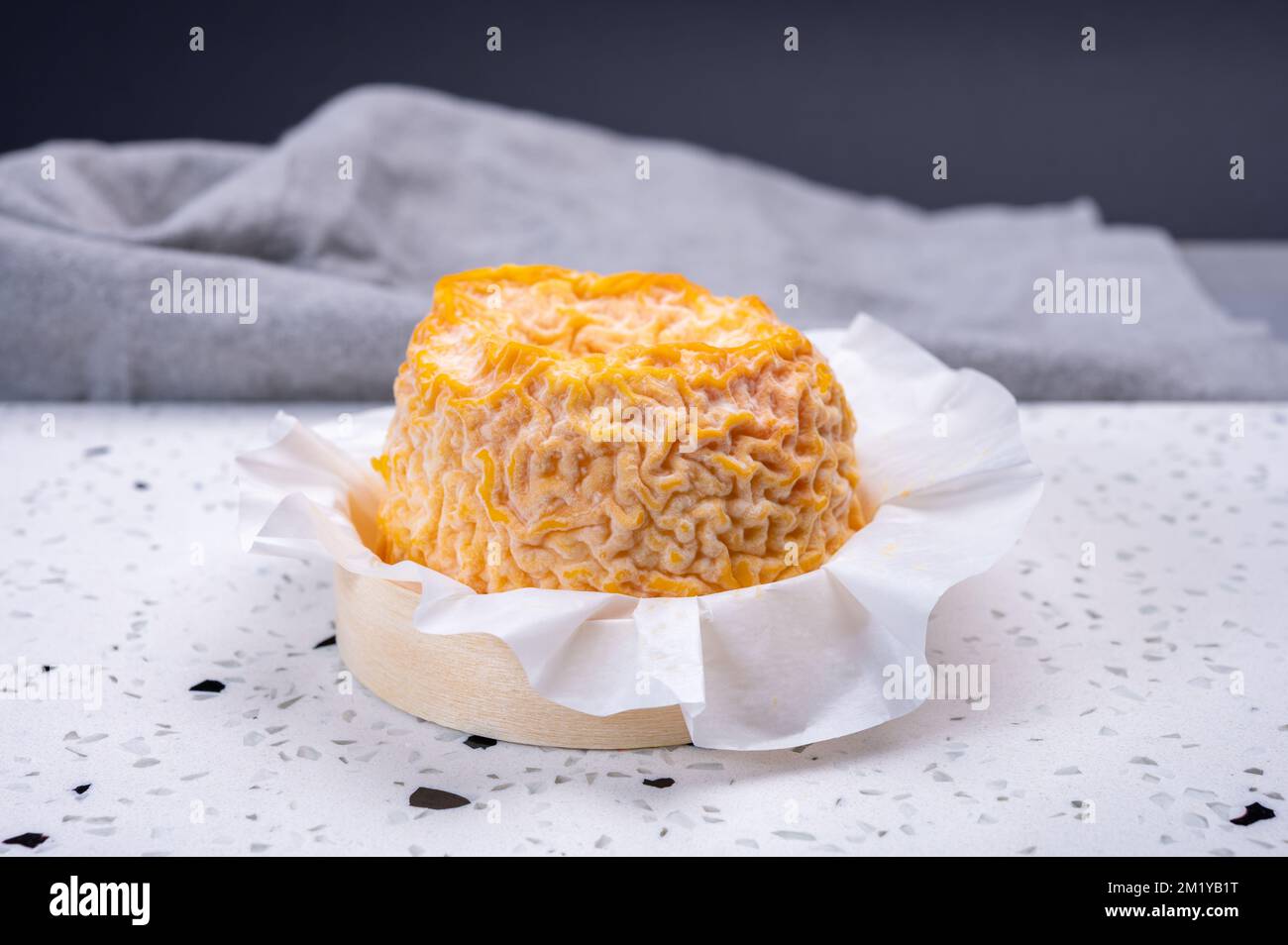 French Langres soft cows crumbly cheese with washed rind structure made ...