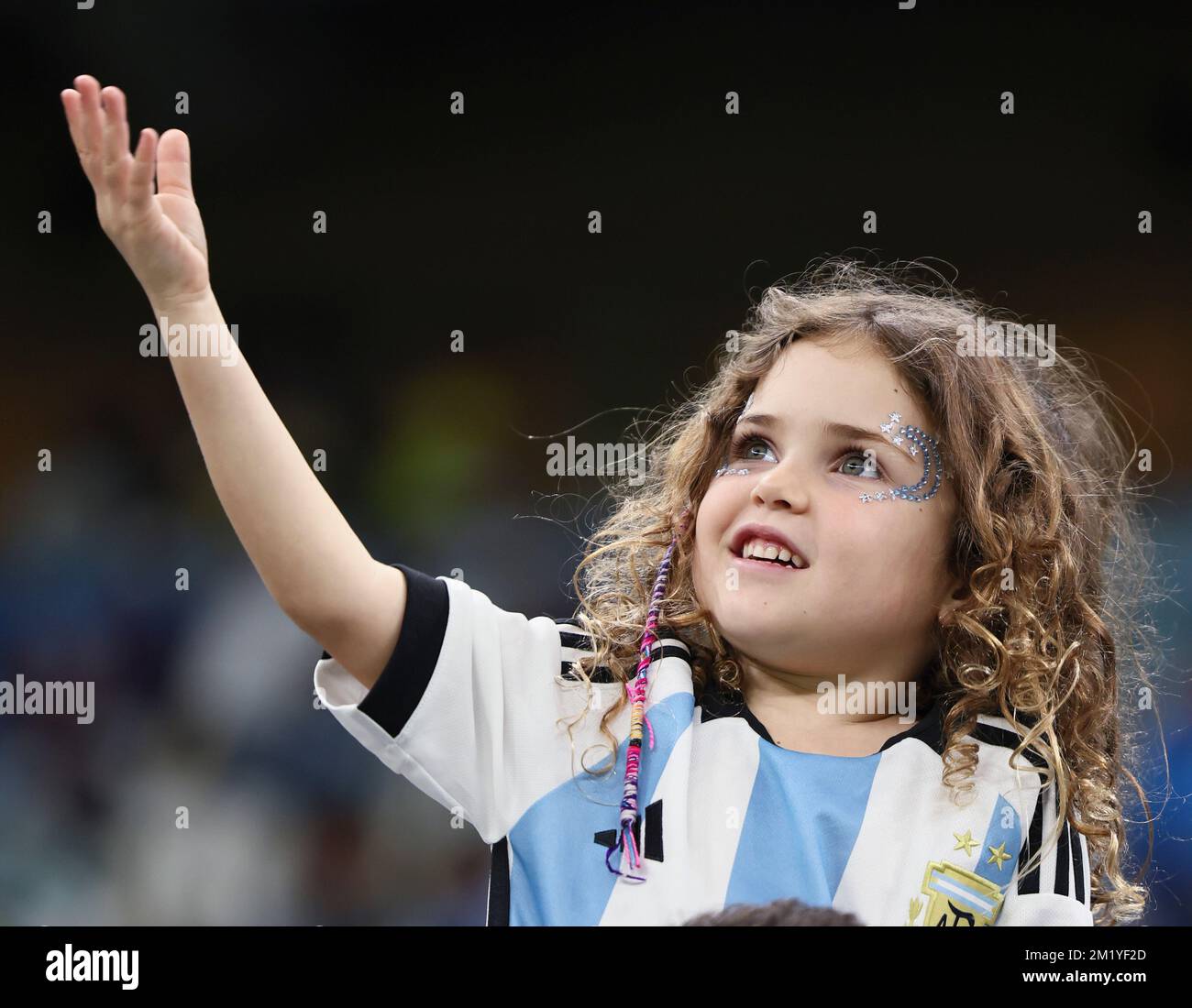 Lusail, Qatar. 13th Dec, 2022. An Argentinean girl waits for the start ...
