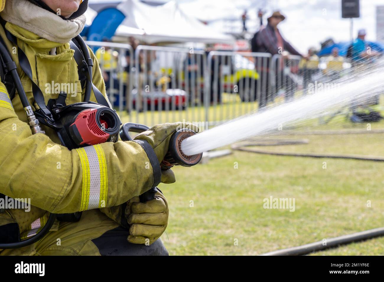 Close up photograph of high velocity water being sprayed by a fire ...
