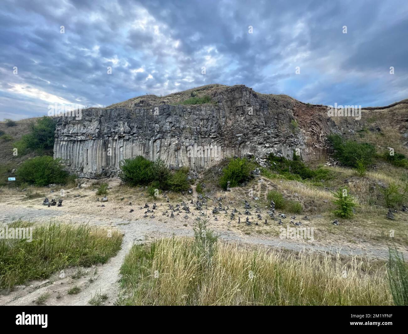 A beautiful view of The Racos Basalt Columns and vegetation against the ...