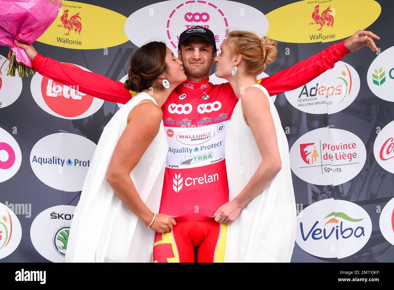 Belgian Sebastien Delfosse celebrates on the podium after the fourth ...