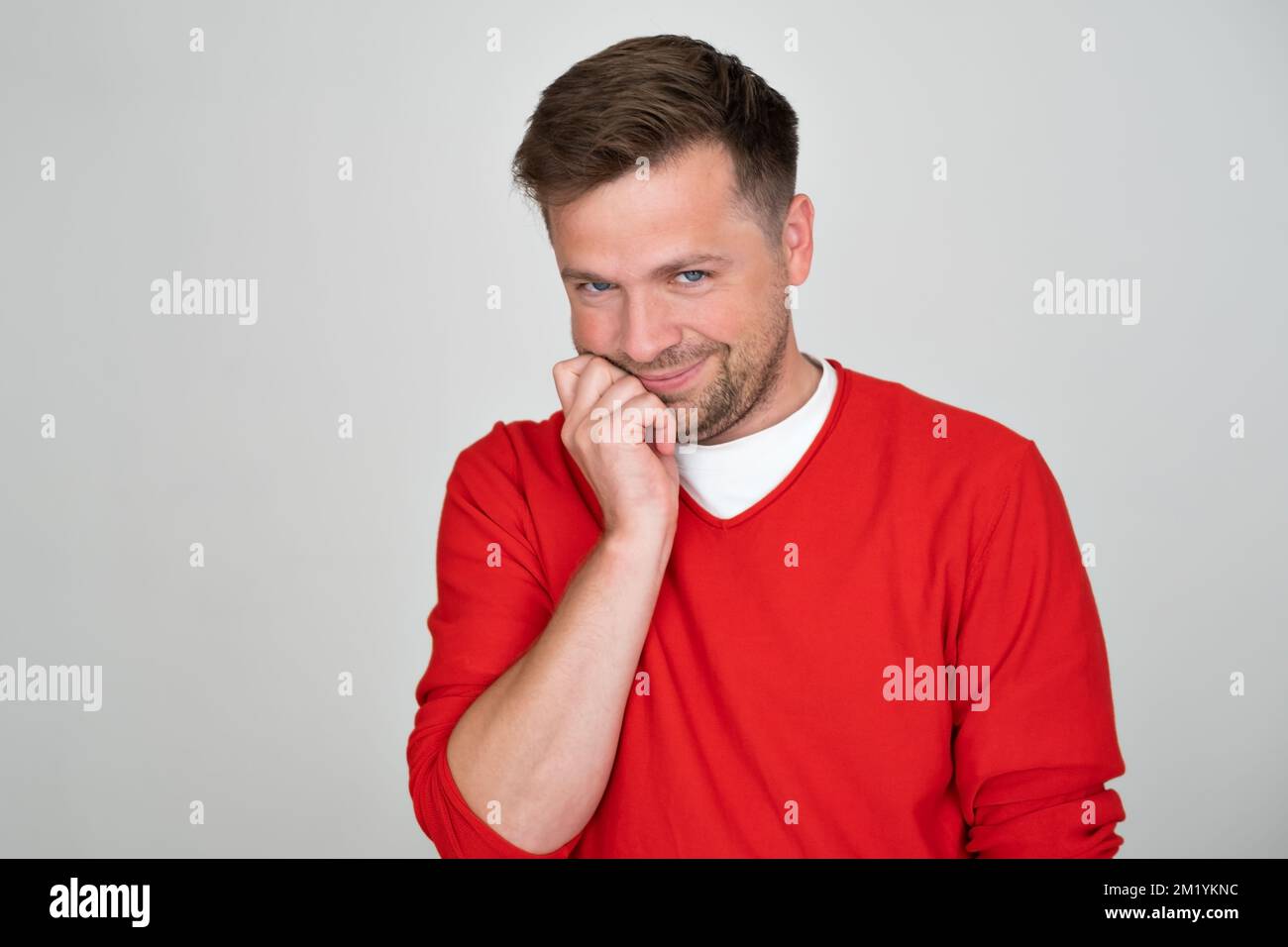Shy handsome adult male looking at camera Stock Photo - Alamy