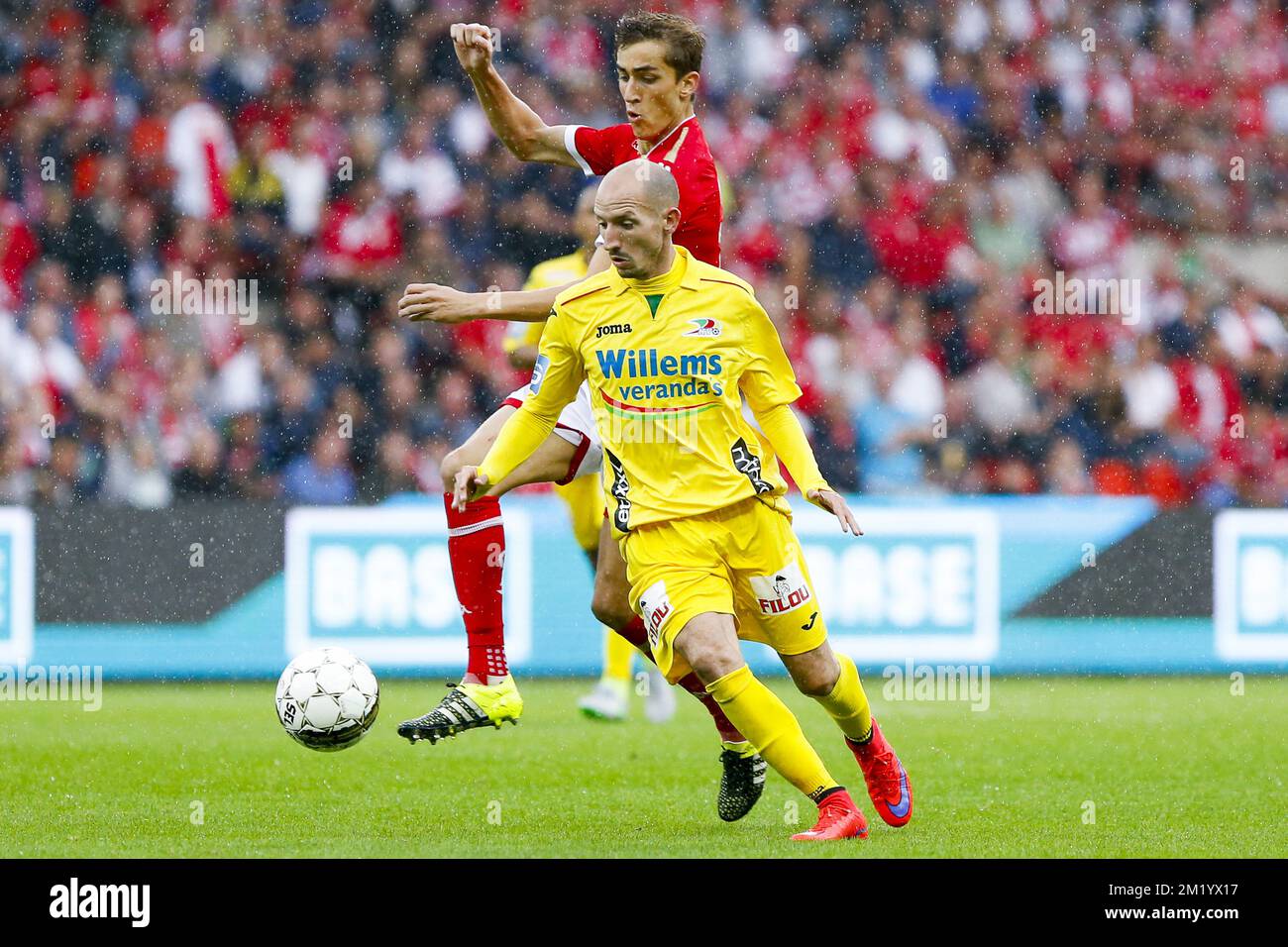 Standard's Julien De Sart and Oostende's Frank Berrier pictured during ...