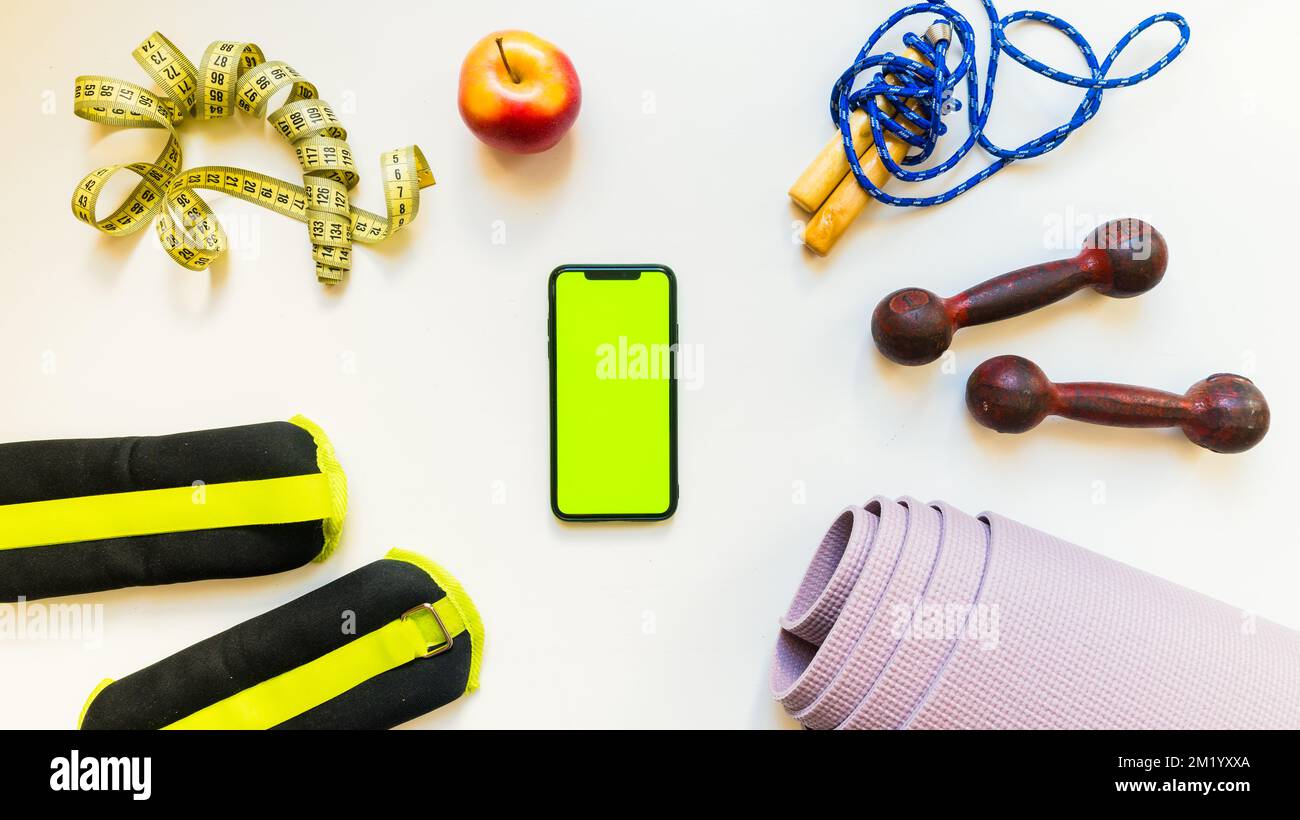Sports Fitness concepts with Gym equipment. Flat lay of mobile phone ...