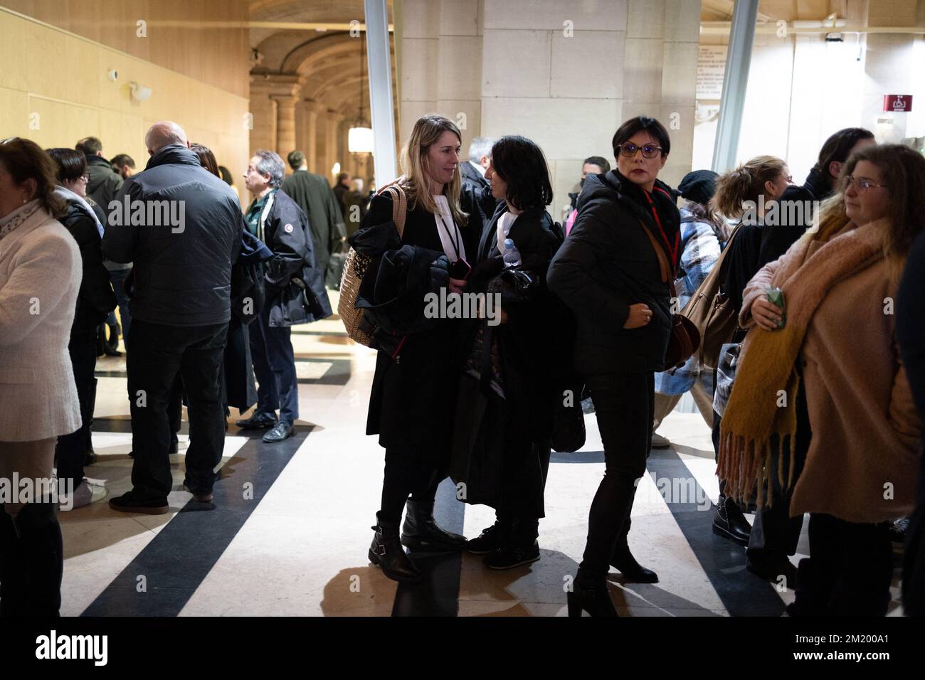 Lawyers hug, next to a temporary courtroom during the verdict’s day of ...