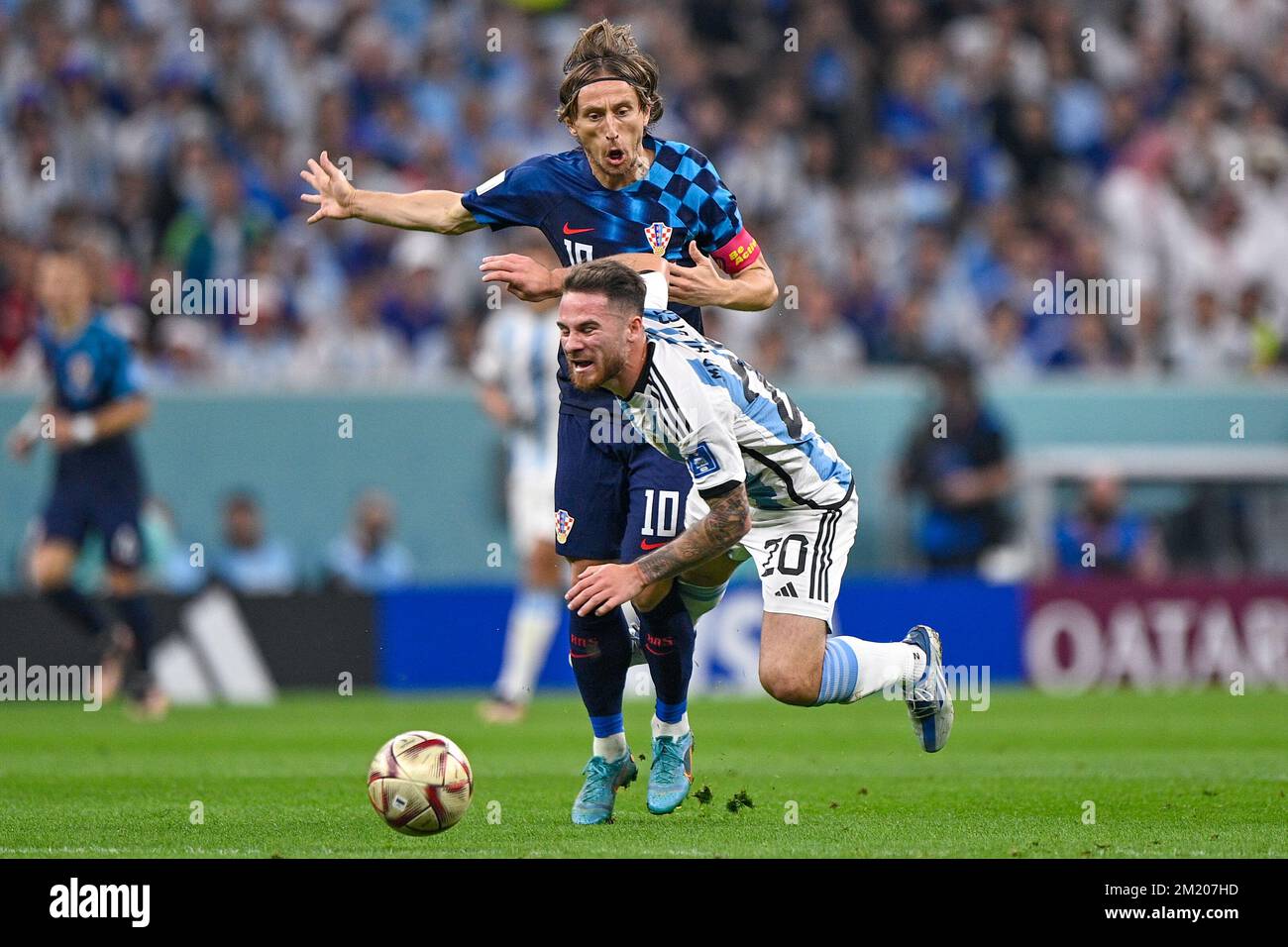 LUSAIL CITY, QATAR - DECEMBER 13: Luka Modric of Croatia battles for ...