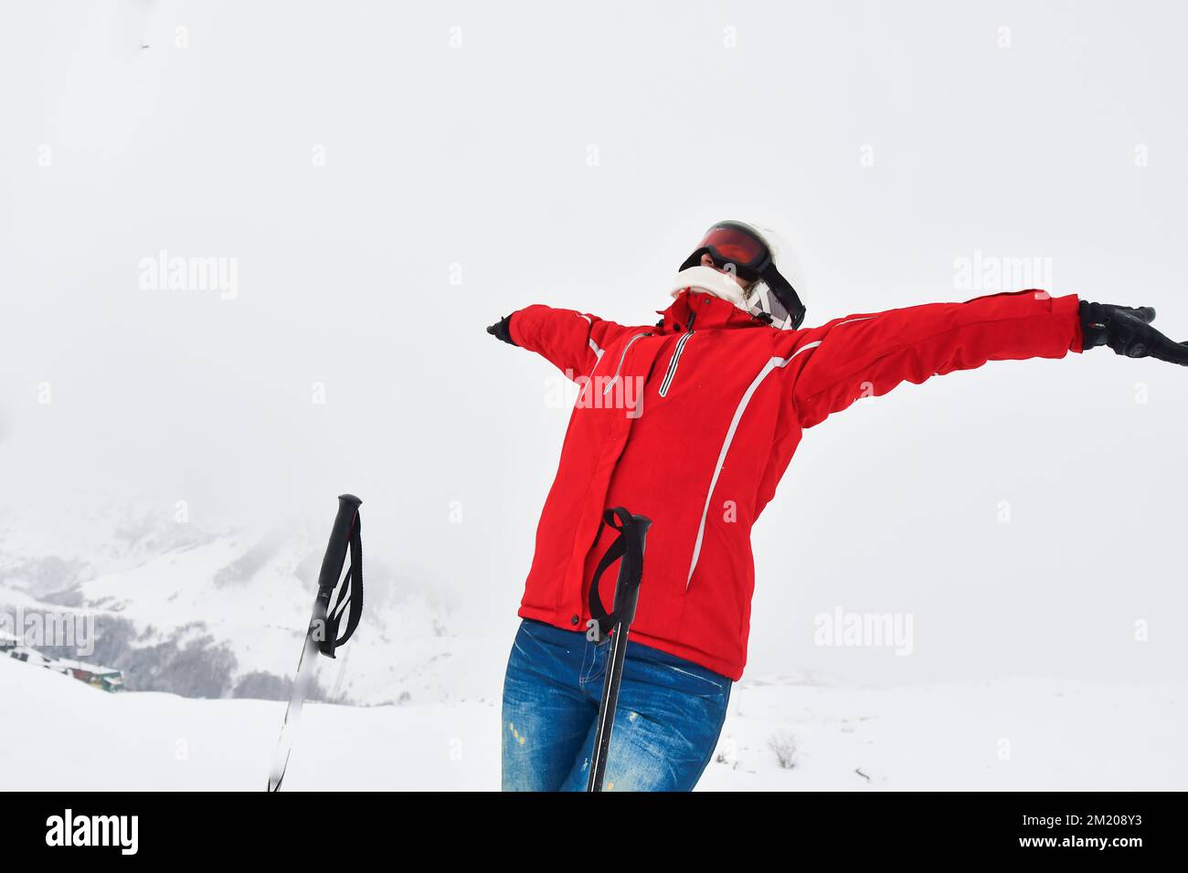 Person in red jacket hi-res stock photography and images - Alamy