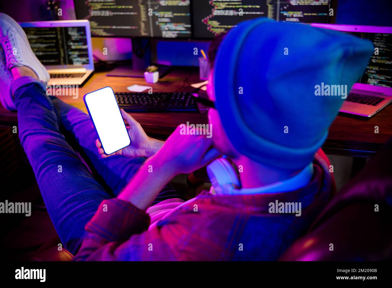 Photo Of Pensive Thoughtful Coder Dressed Hat Eyewear Creating Cell App Modern Gadget Empty