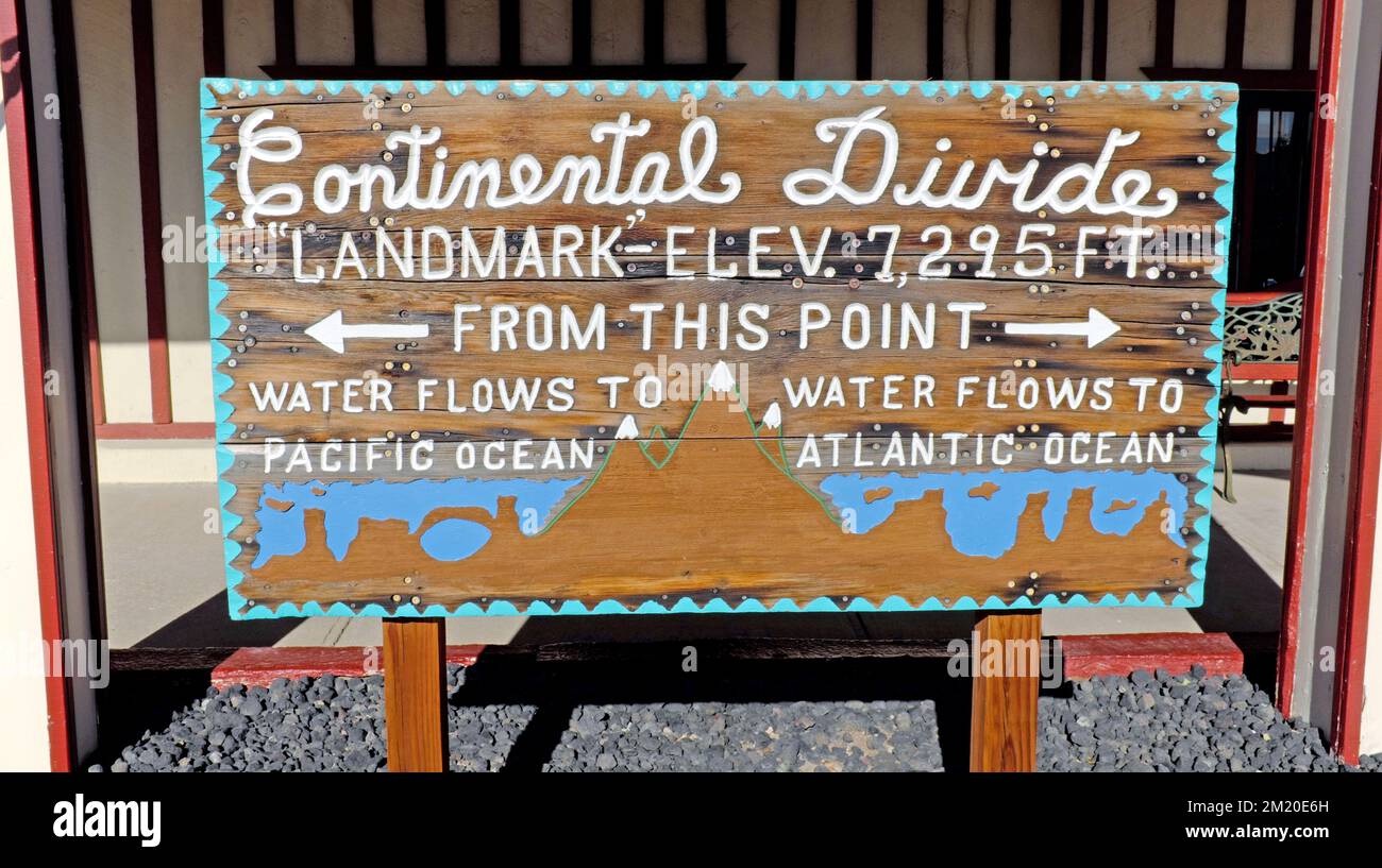 Continental Divide sign in Continental Divide, Colorado shows water ...