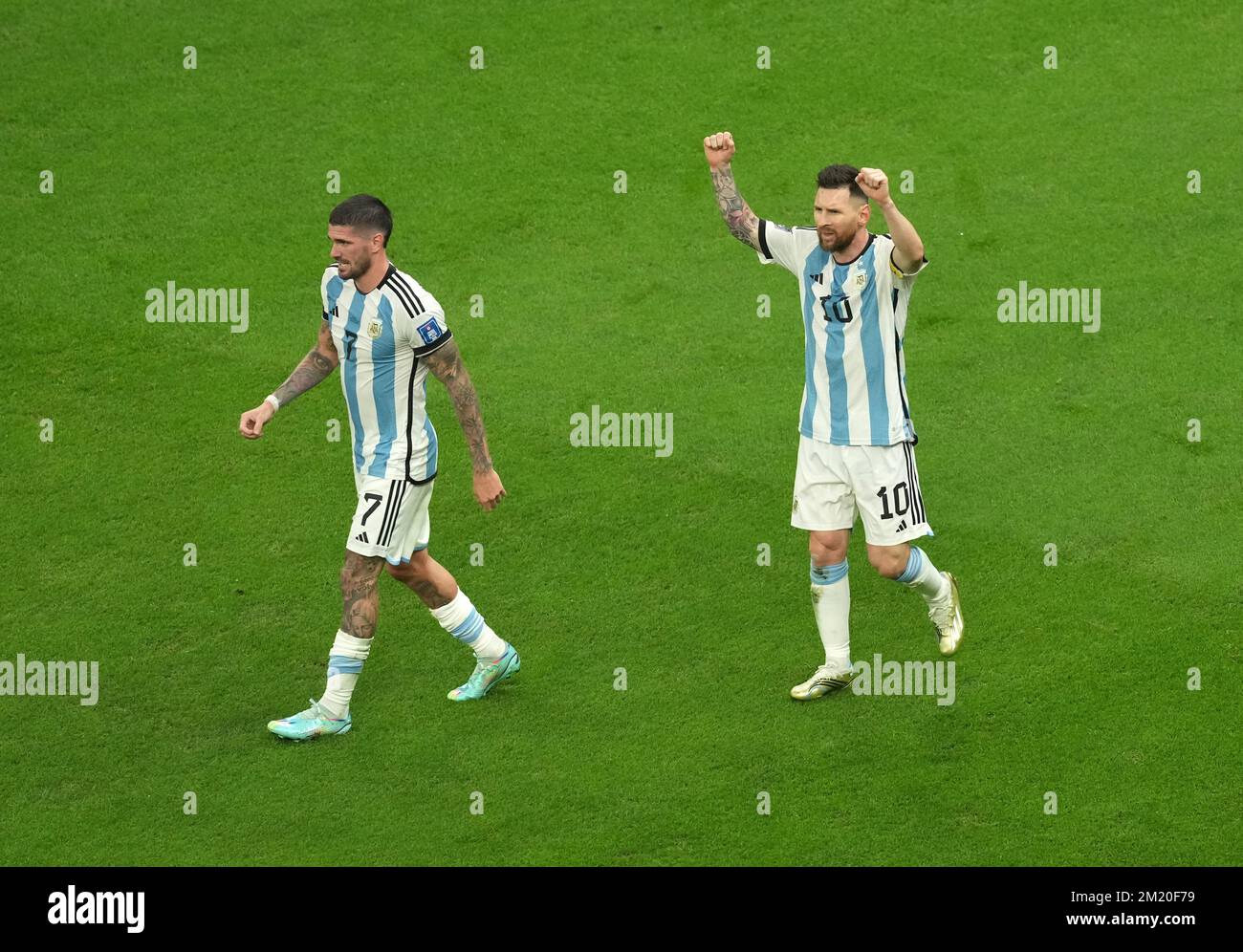 Argentina's Lionel Messi (right) celebrates scoring their side's first ...