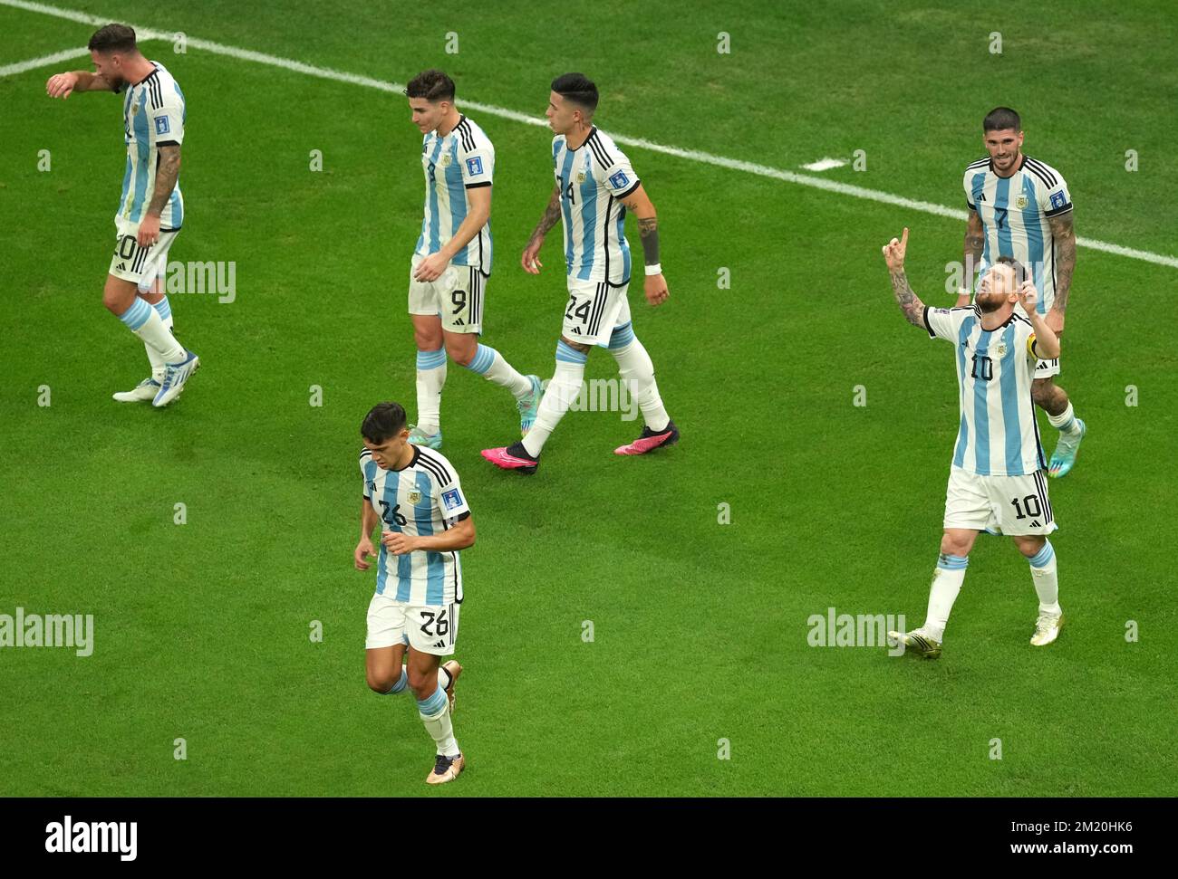 Argentina's Lionel Messi (right) celebrates scoring their side's first ...