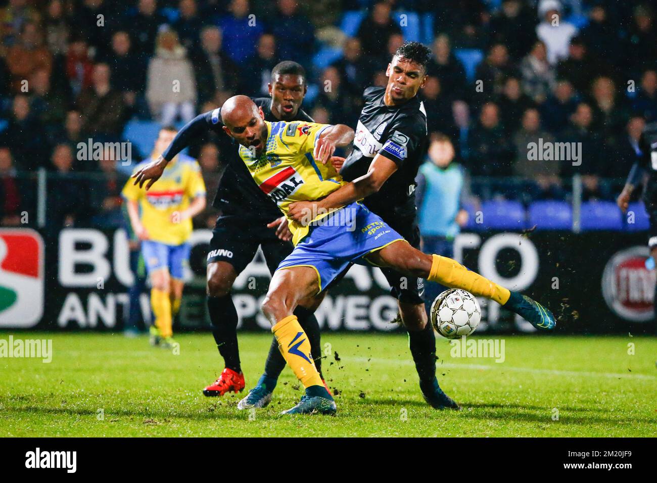20151211 - WESTERLO, BELGIUM: Westerlo's Frederic Gounongbe and Genk's ...