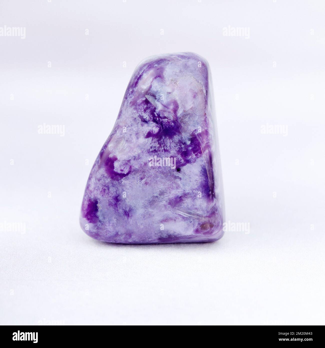 Macro close up colour photograph of 'Charoite' a semi precious crystal ...