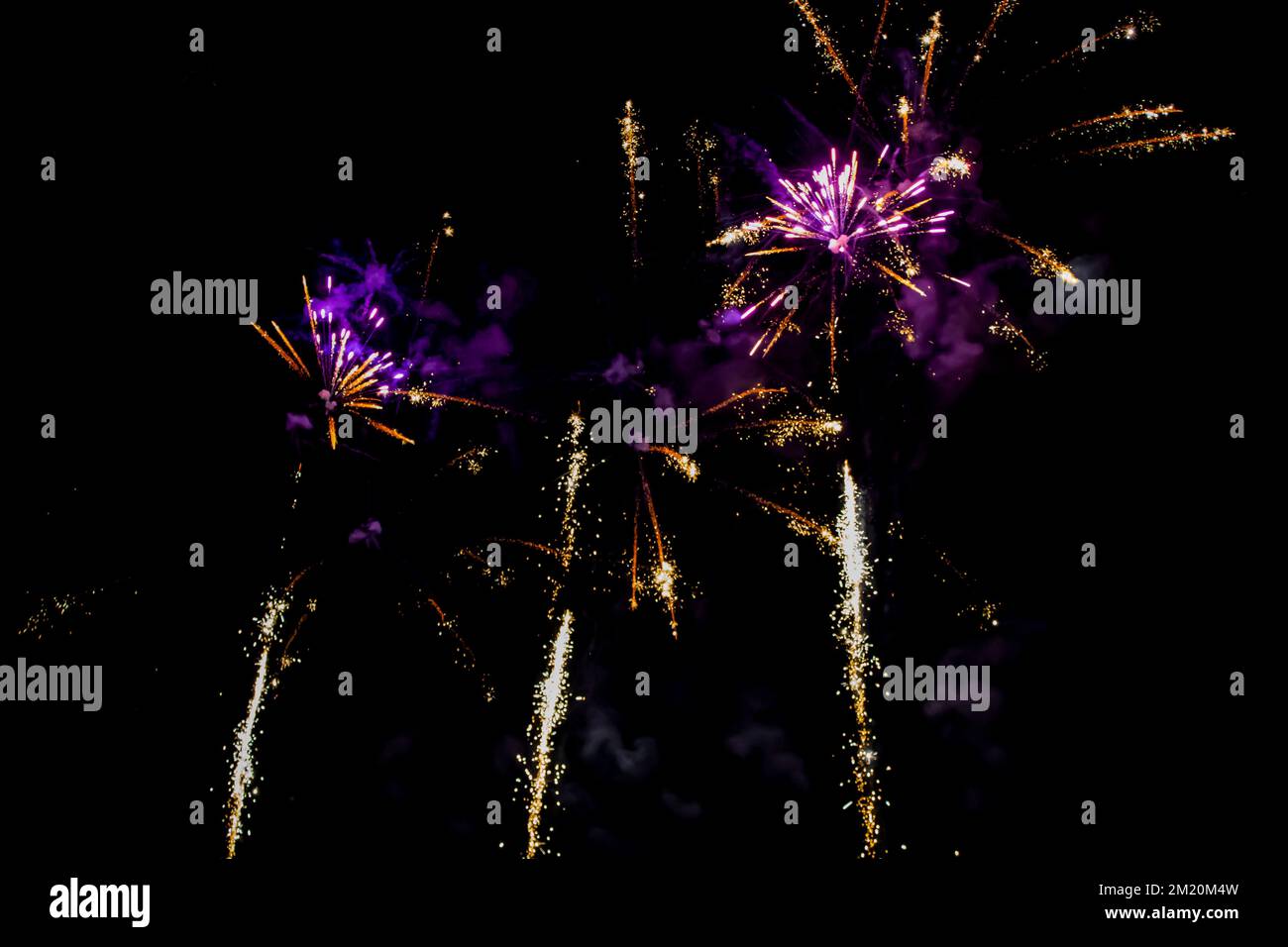 Fireworks ,Gold and purple lights Stock Photo - Alamy