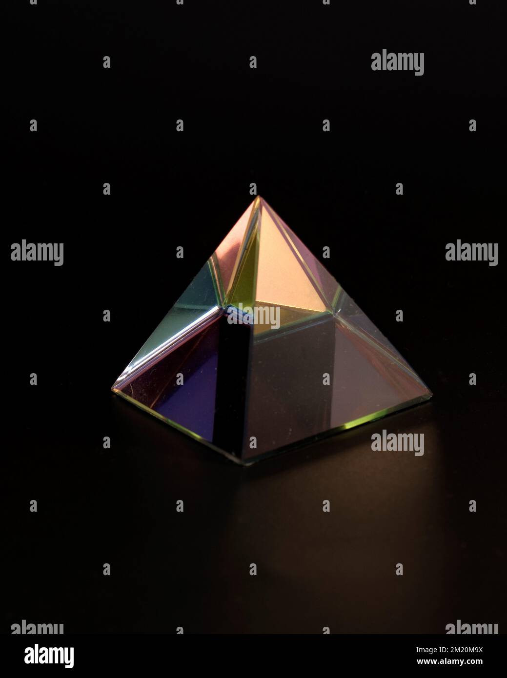 Macro close up colour photograph of 'Crystal Pyramid' a semi precious ...