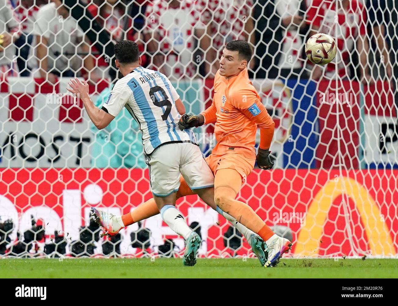Argentina's Julian Alvarez fouled by Croatia goalkeeper Dominik ...