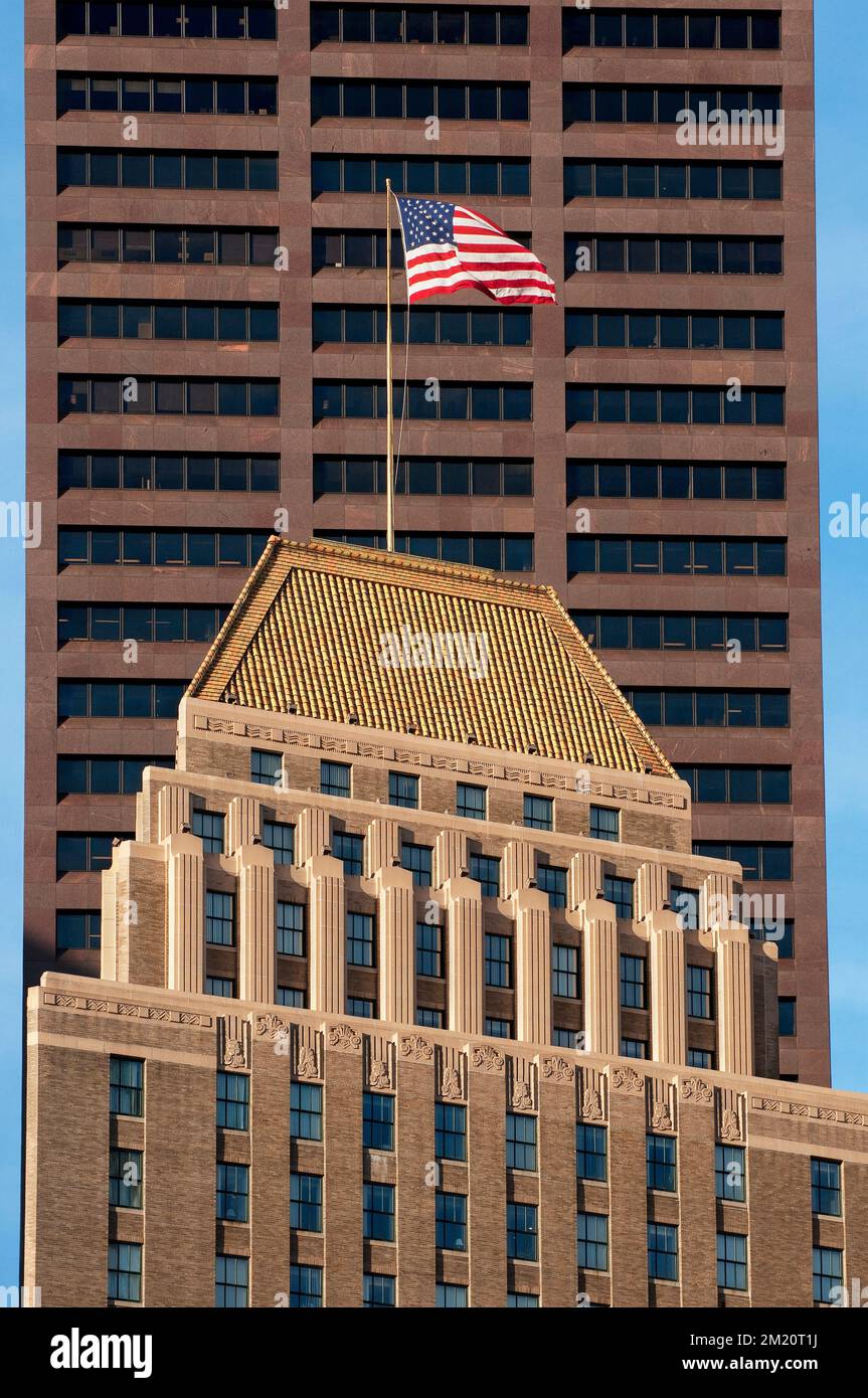 The American flag waving at the top of the 21-story United Shoe ...