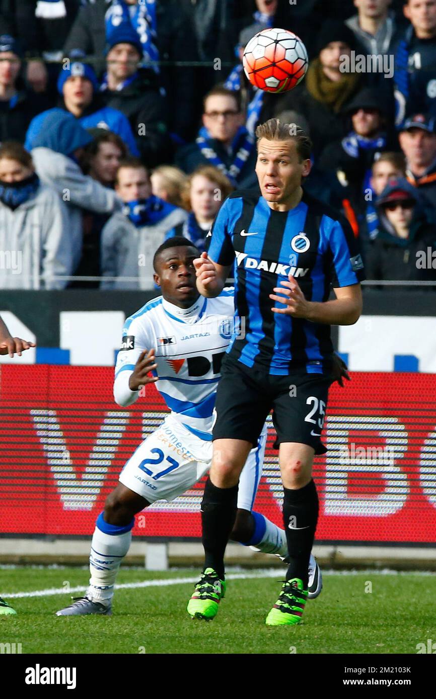 Gent's Moses Simon and Club's Rudy Ruud Vormer fight for the ball ...
